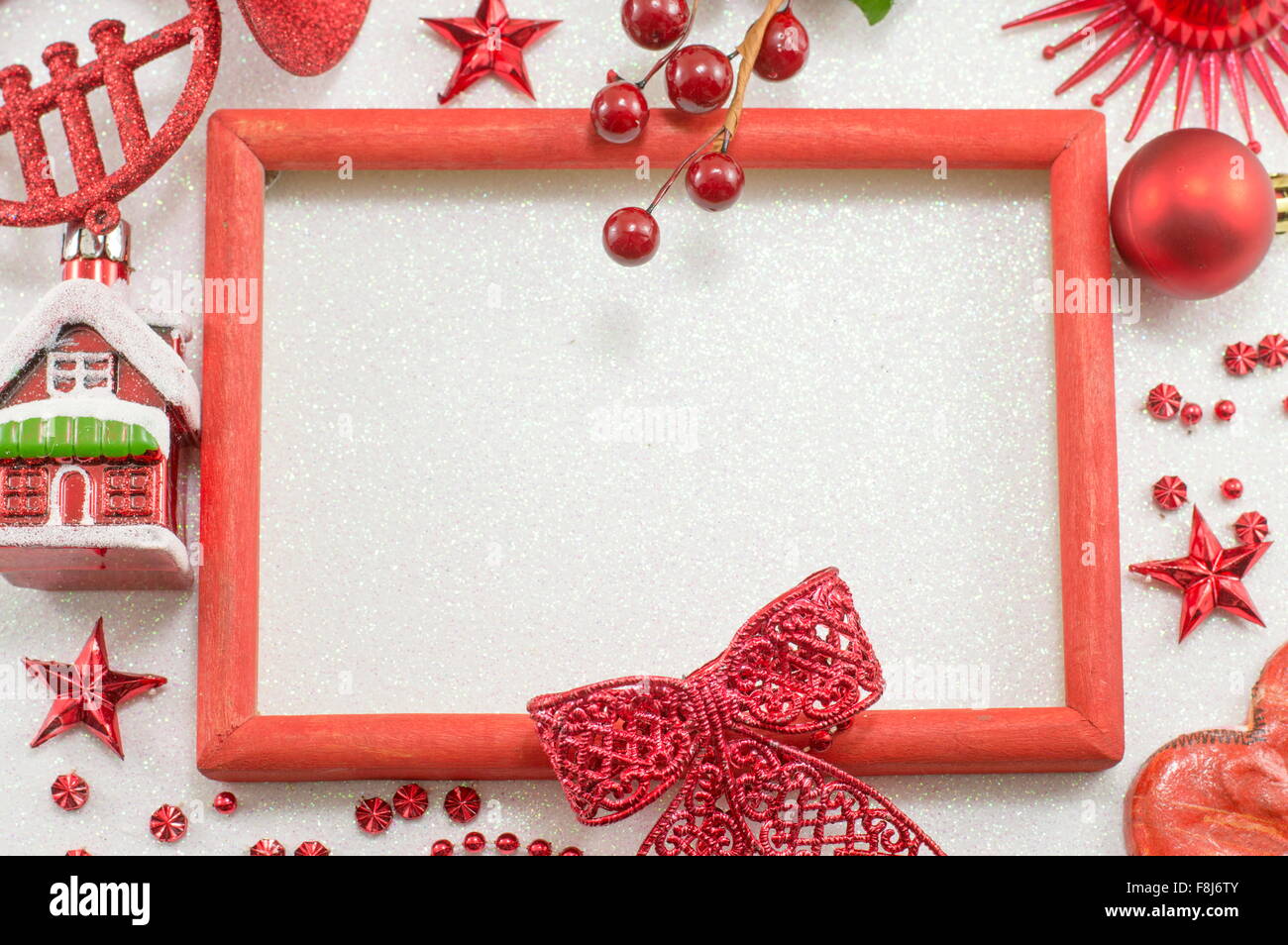 Red photo frame with RED Christmas decorations Stock Photo - Alamy