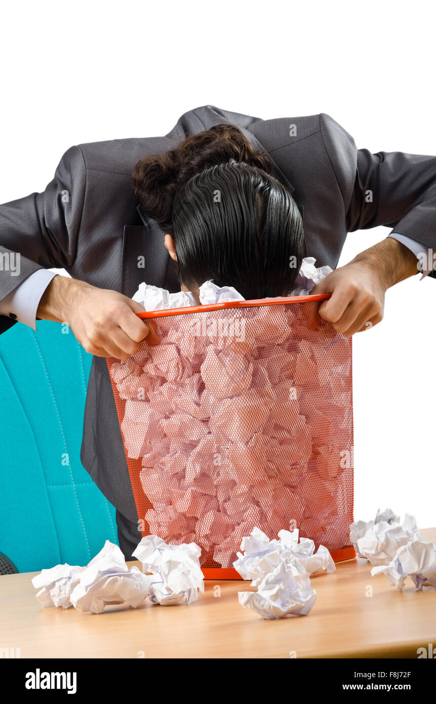 Man with lots of wasted paper Stock Photo - Alamy