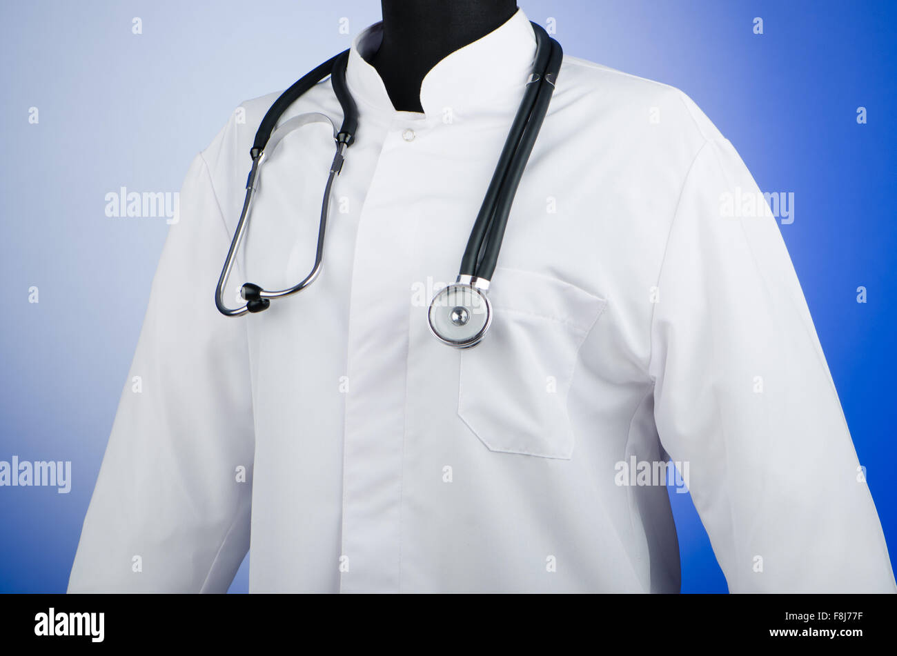 Doctor coat with the stethoscope Stock Photo - Alamy