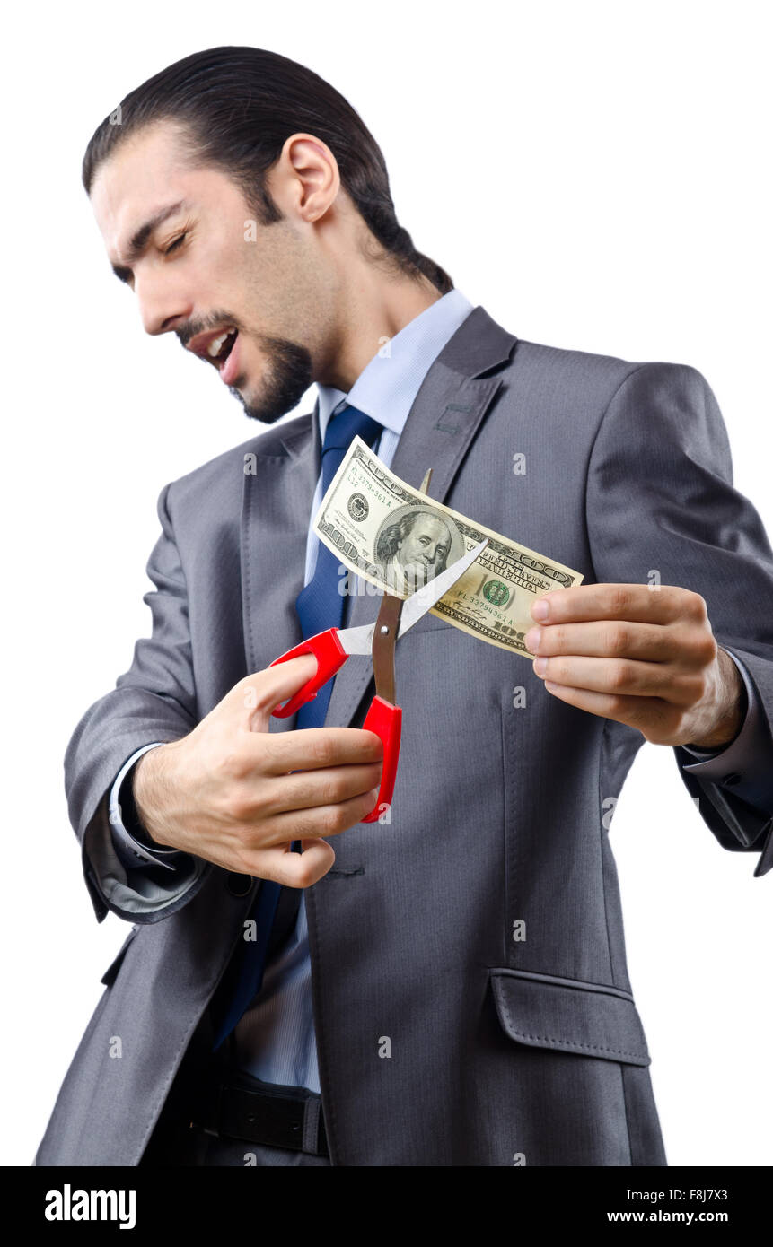 Man cutting money on white Stock Photo - Alamy