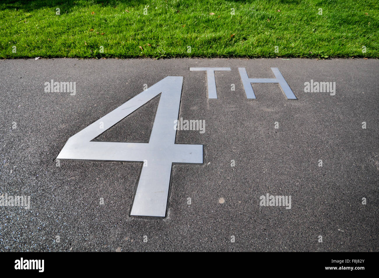 metal lettering 4th on the pavement on the promenade in front of hotel ...