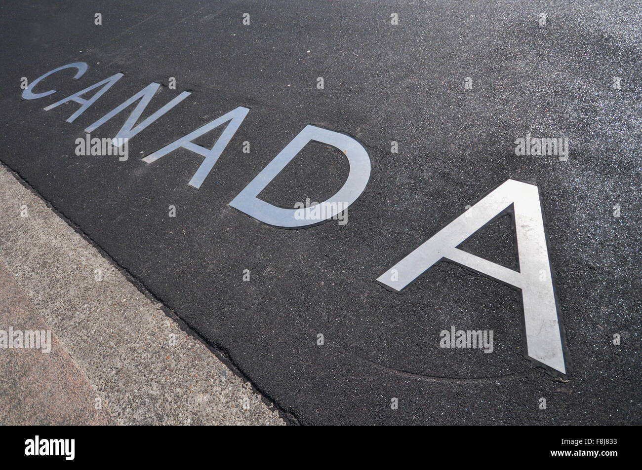 metal lettering CANADA on the pavement on the promenade in front of ...
