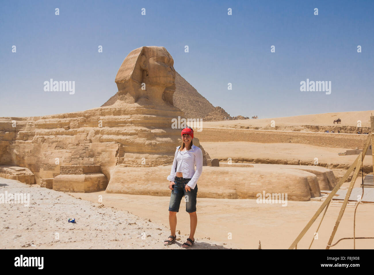 Happy tourist girl near the sphinx of Giza in Cairo, Egypt Stock Photo ...