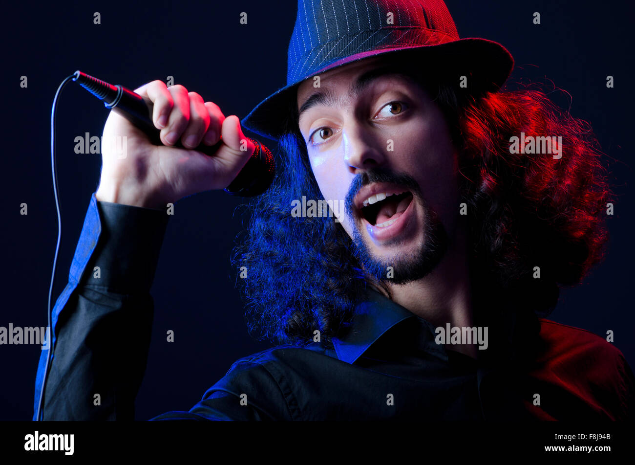 Man singing at the concert Stock Photo - Alamy