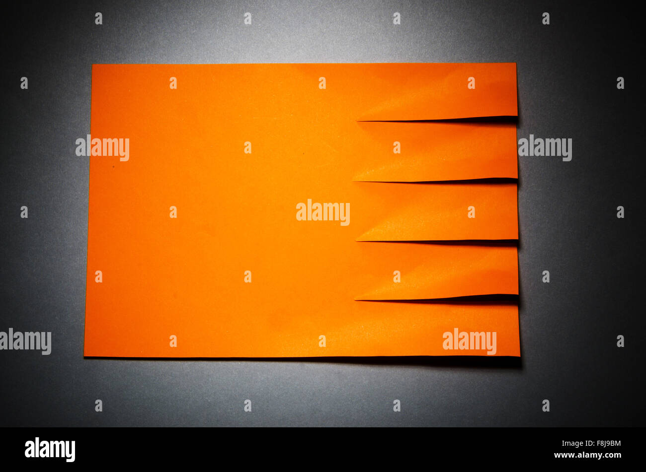 Tear off paper notice on the wall Stock Photo - Alamy