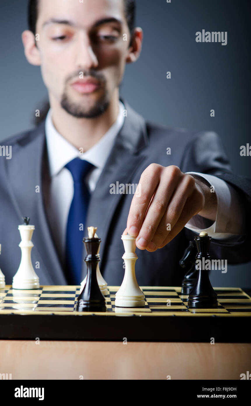 Chess player playing his game Stock Photo - Alamy