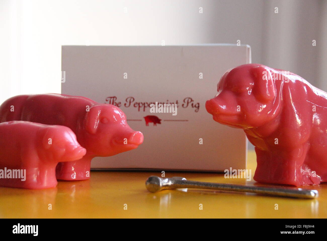 New York, USA. 5th Dec, 2015. Pink-coloured peppermint pigs and a small ...