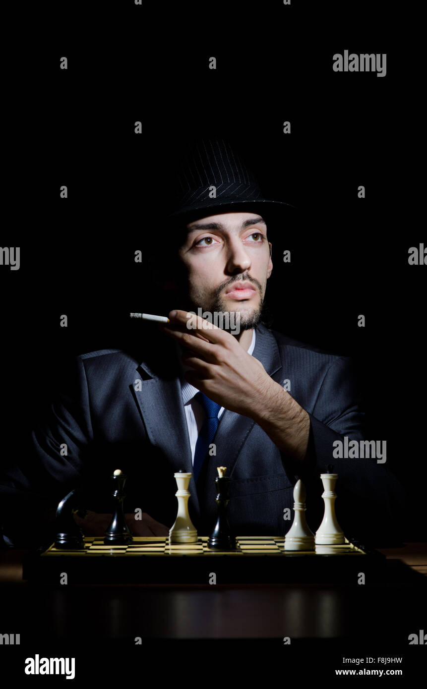 Chess player playing his game Stock Photo - Alamy
