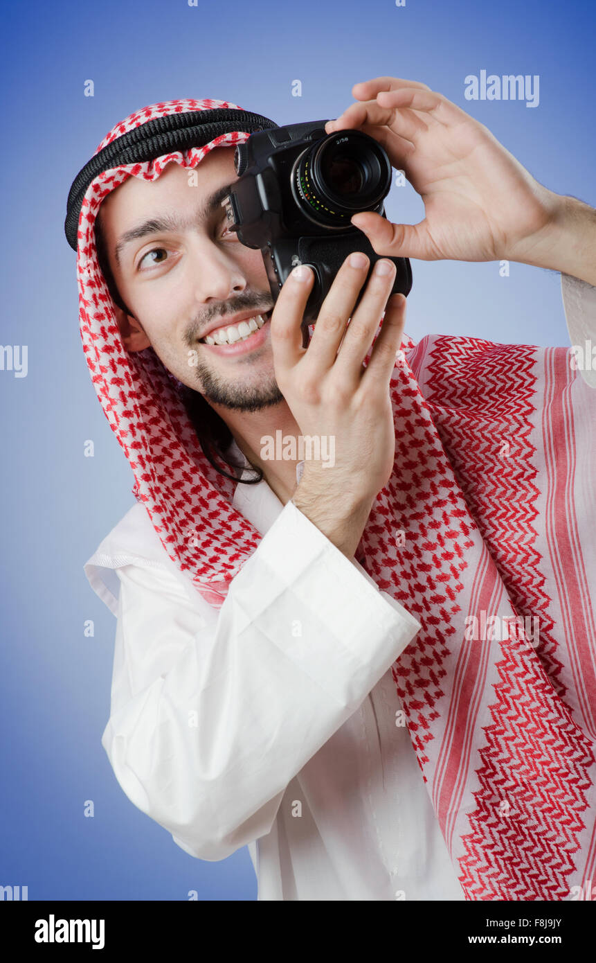 Arab photographer in studio shooting Stock Photo - Alamy