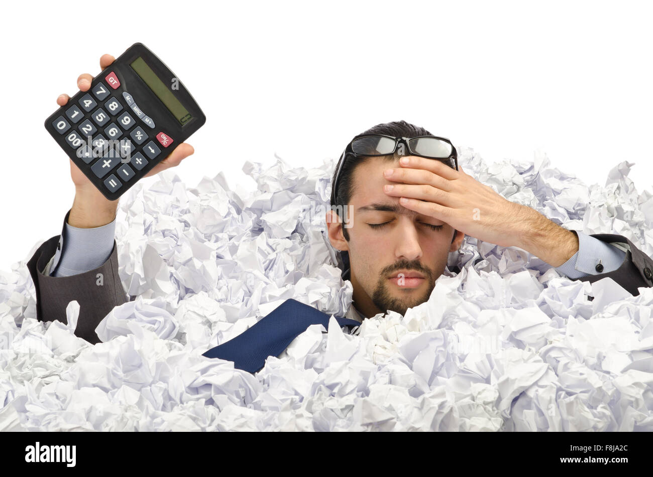 Man with lots of waste paper Stock Photo - Alamy