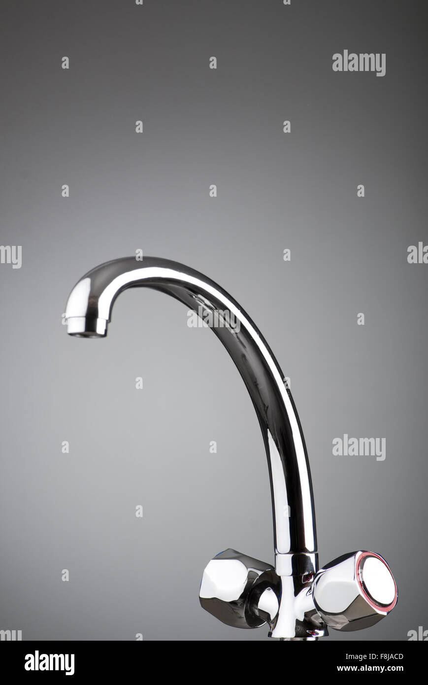 Shiny tap on the gradient Stock Photo - Alamy
