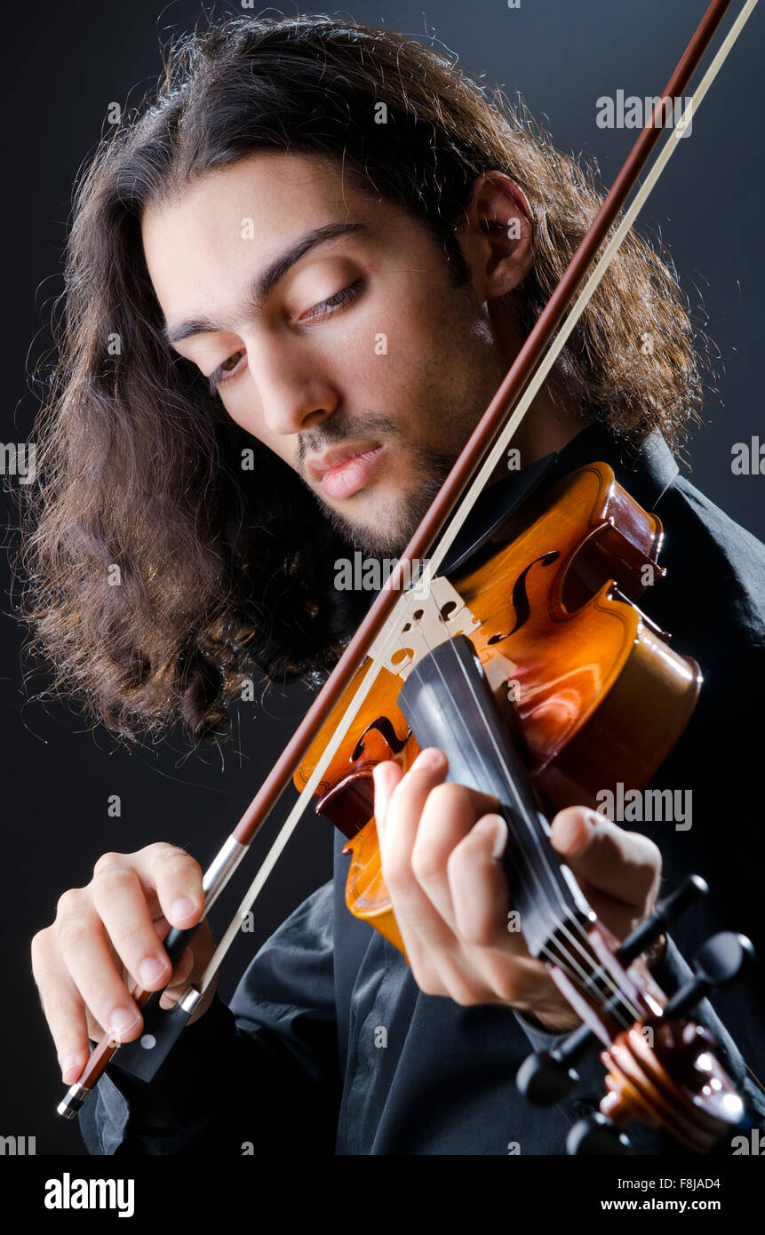Violin player playing the intstrument Stock Photo - Alamy