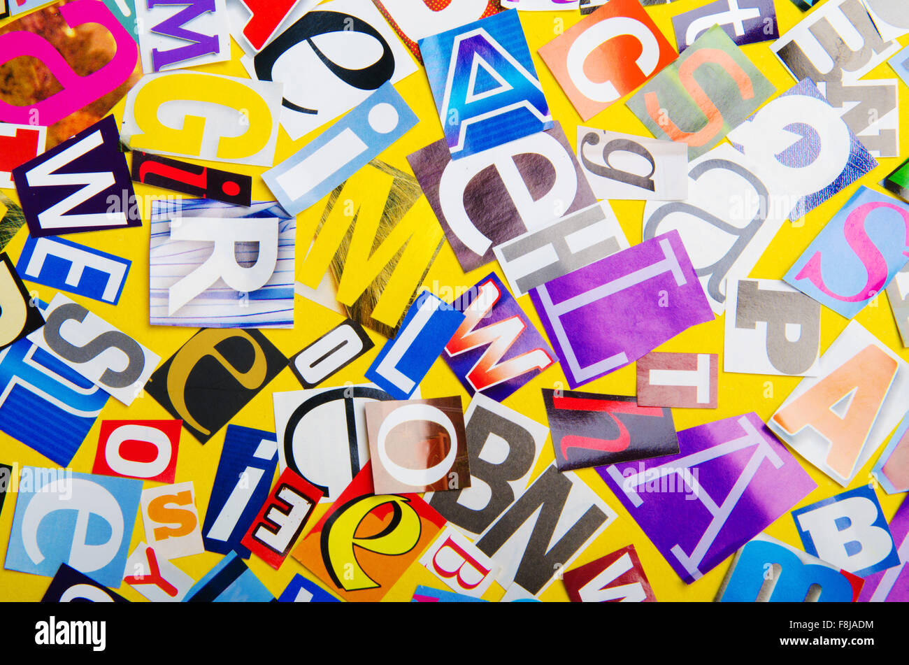 Newspaper clippings with various letters Stock Photo - Alamy