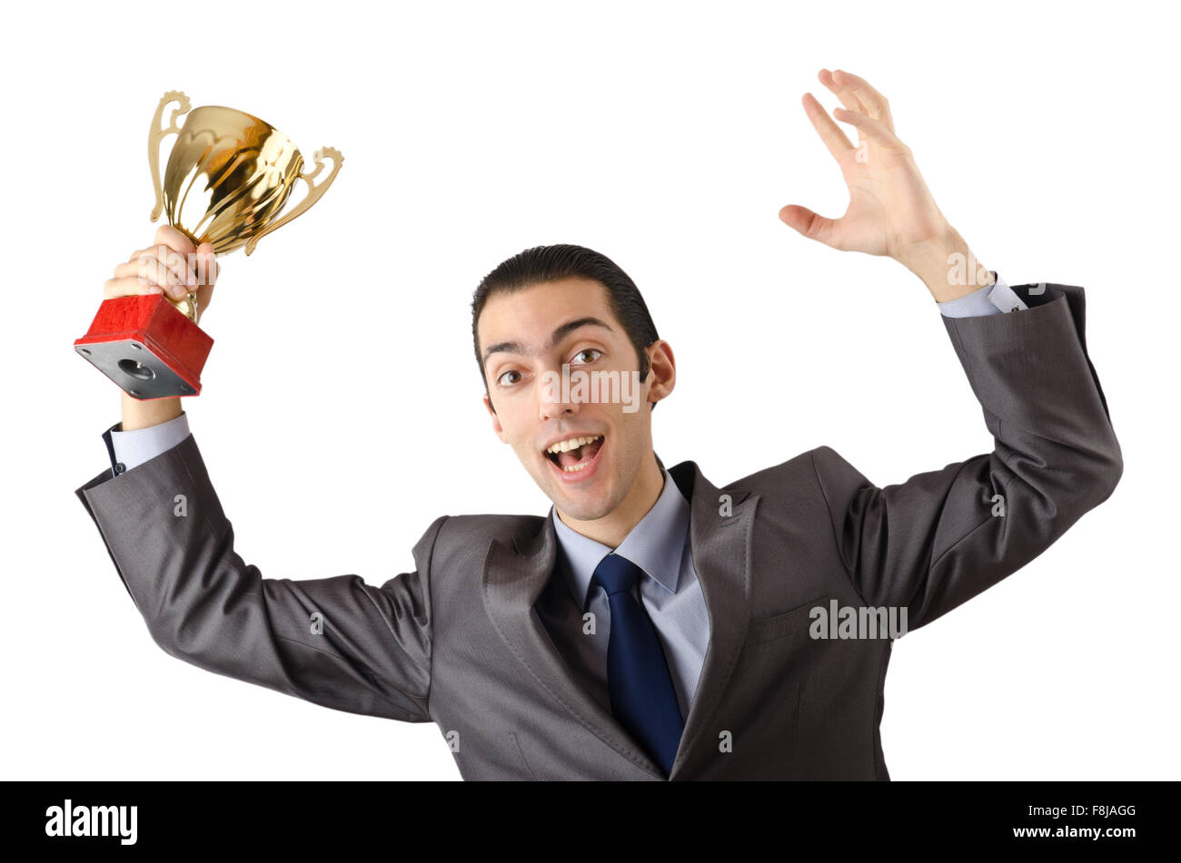 Golden trophy is being awarded to the winner hi-res stock photography ...