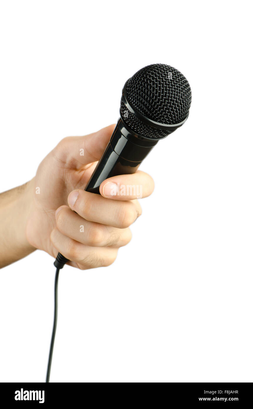 Hand holding microphone on white Stock Photo - Alamy