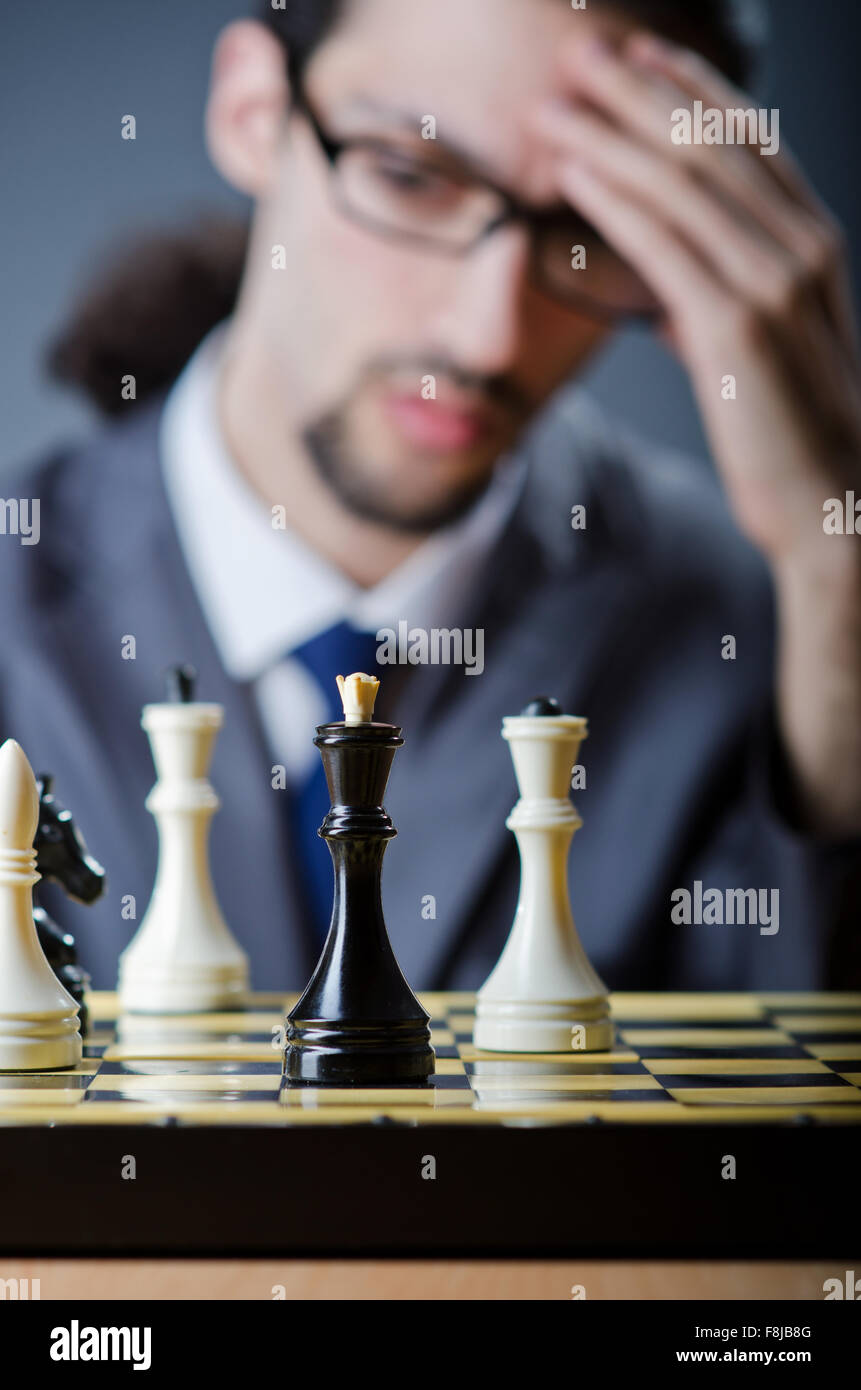 Chess player playing his game Stock Photo - Alamy
