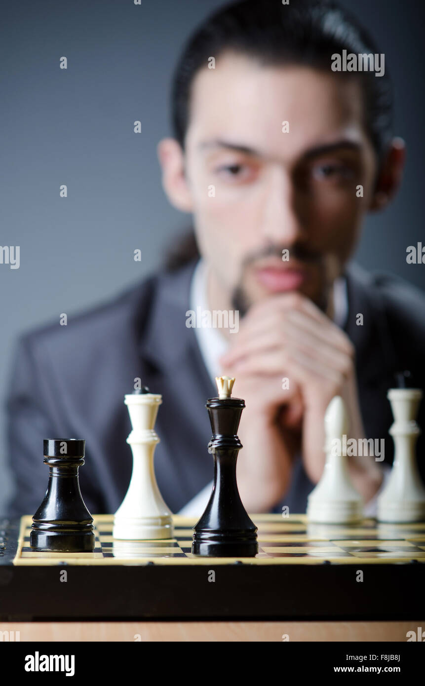 Chess player playing his game Stock Photo - Alamy
