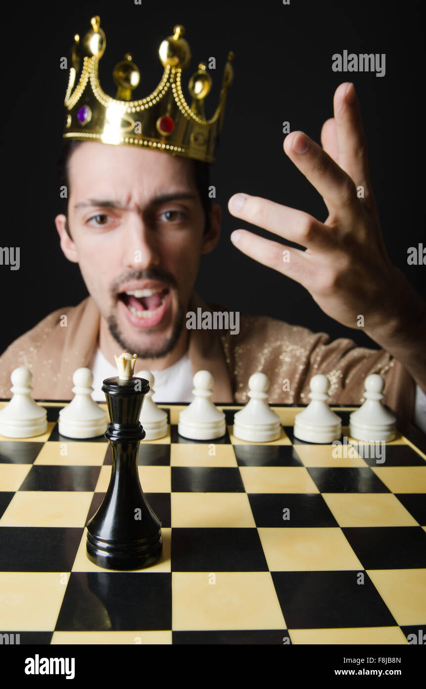 Chess player playing his game Stock Photo - Alamy