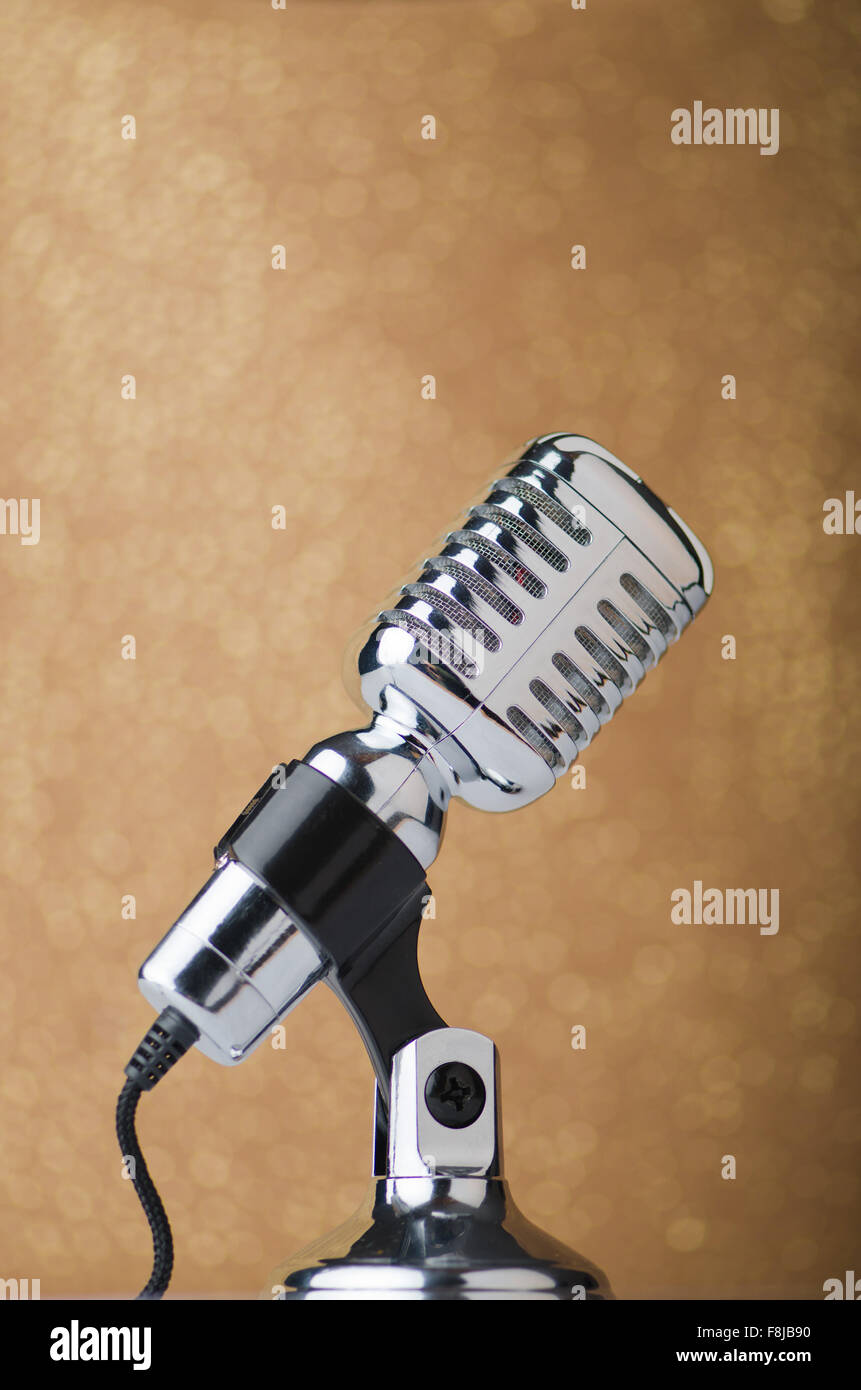 Old vintage microphone on background Stock Photo - Alamy