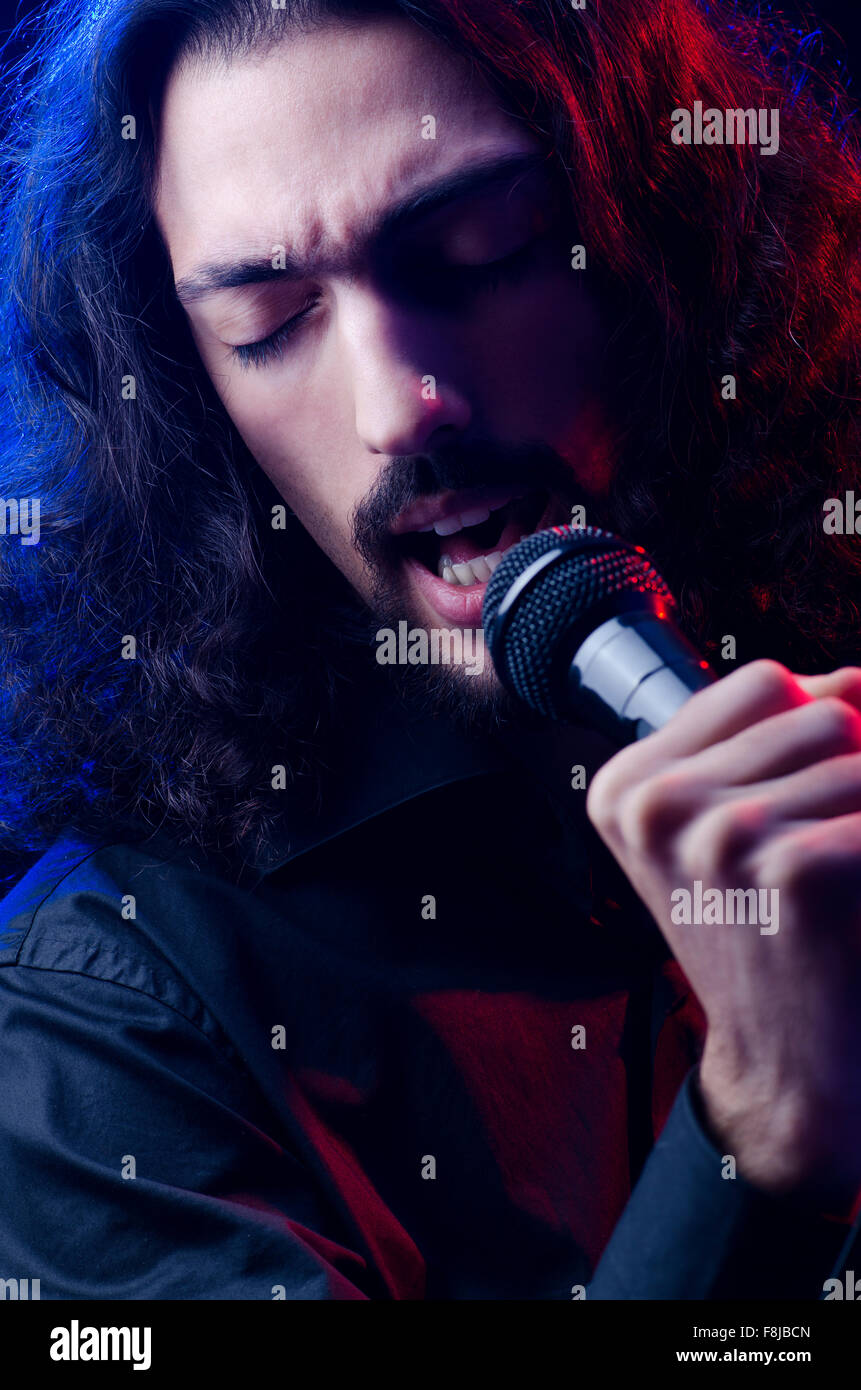 Man singing at the concert Stock Photo - Alamy