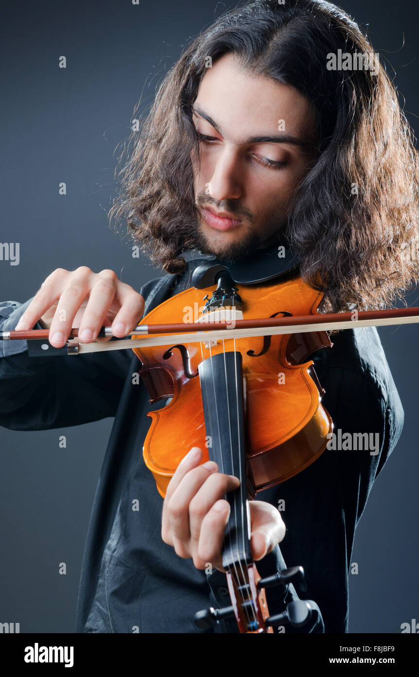 Violin player playing the intstrument Stock Photo - Alamy