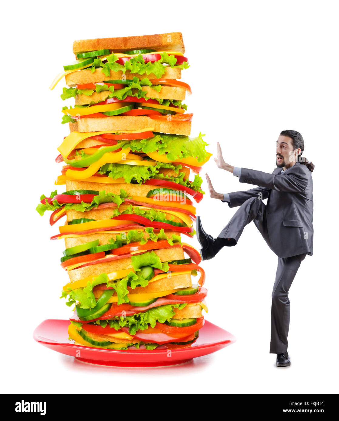 Man and giant sandwich on white Stock Photo - Alamy