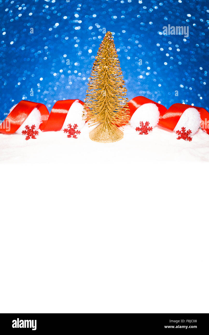 christmas tree in snow on glitter background Stock Photo - Alamy