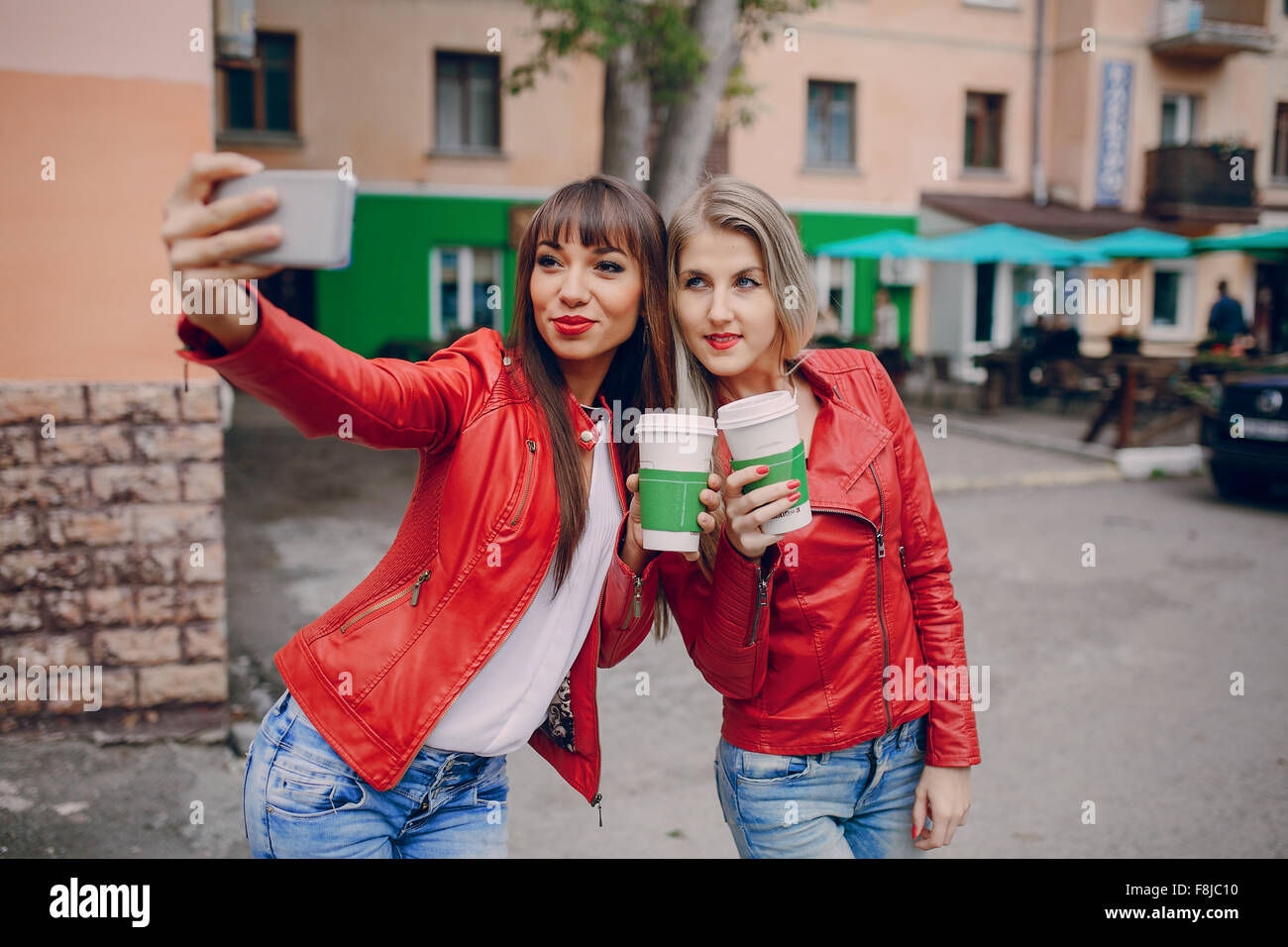 girls with phone Stock Photo - Alamy