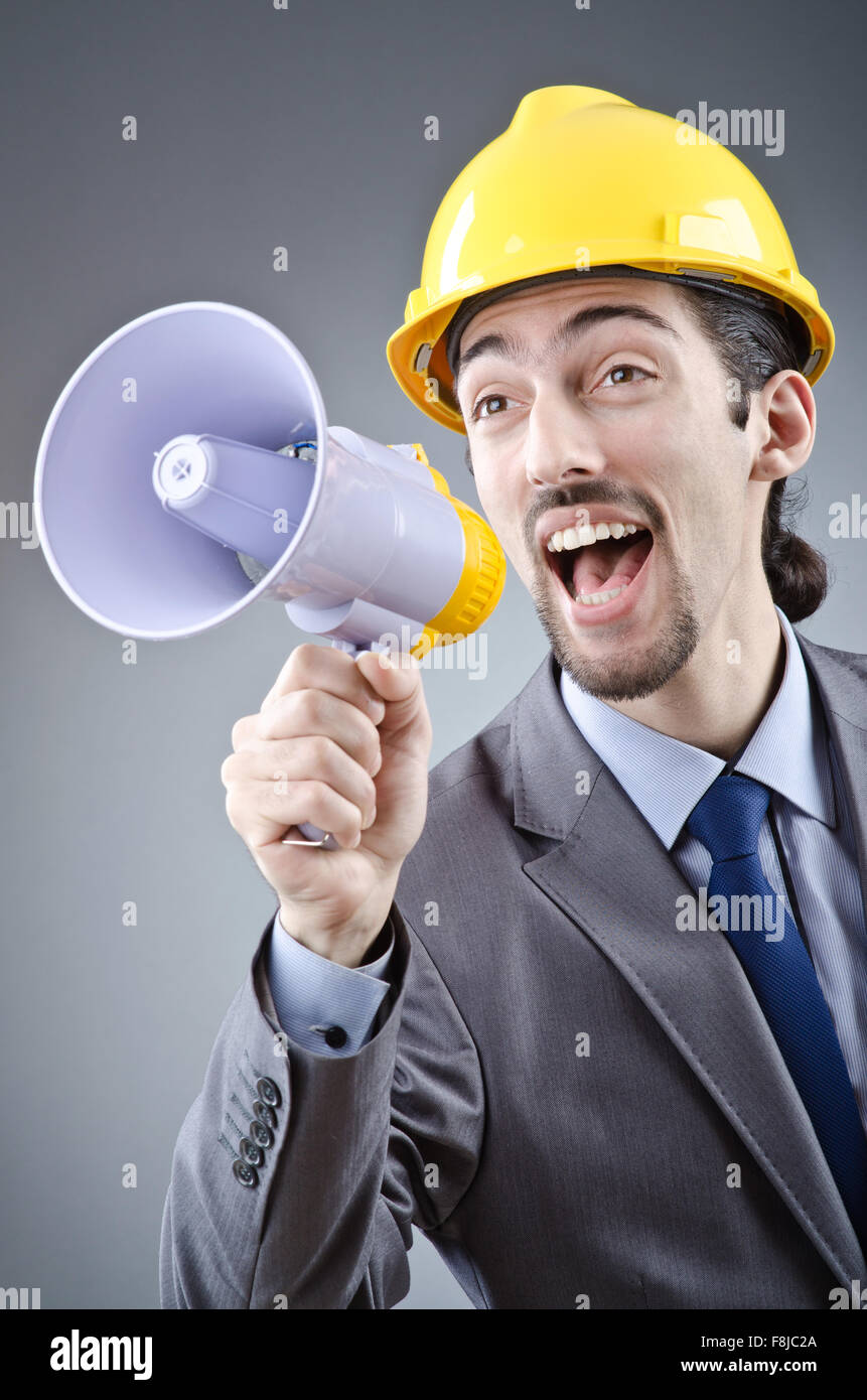 Man shouting and yelling with loudspeaker Stock Photo - Alamy