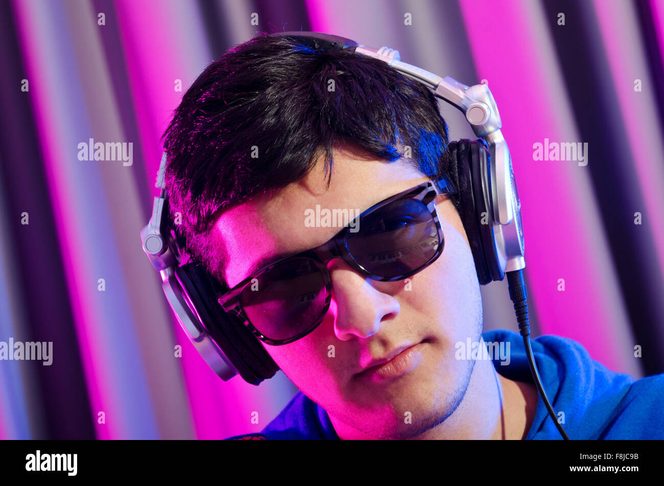 Young DJ playing his music Stock Photo - Alamy