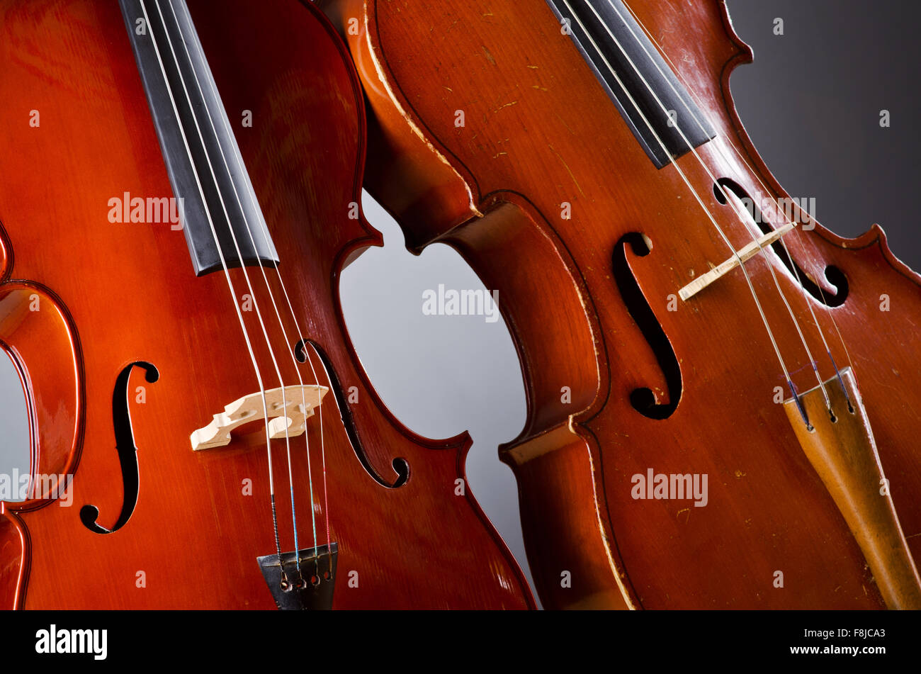 Music Cello in the dark room Stock Photo - Alamy