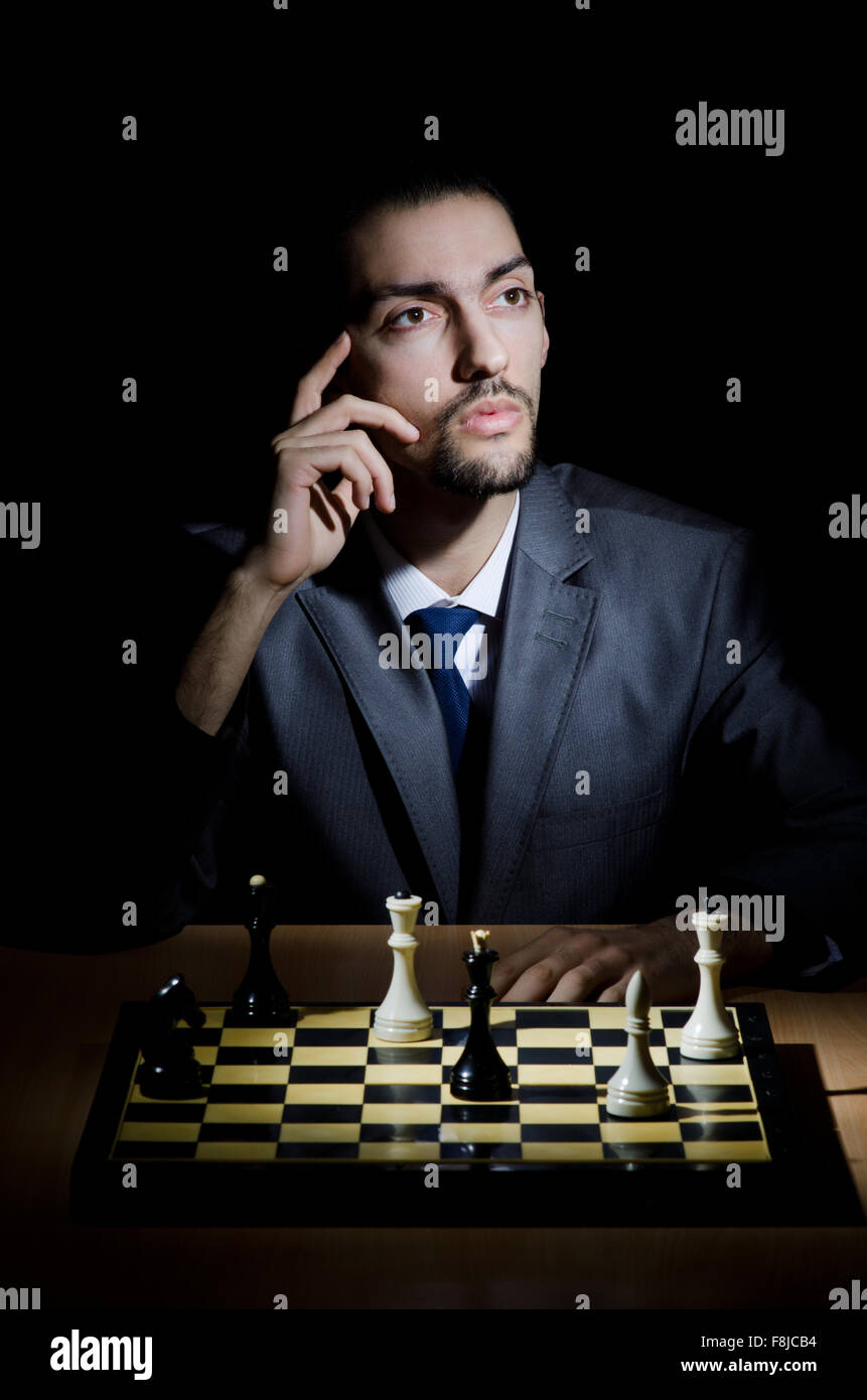 Chess player playing his game Stock Photo - Alamy