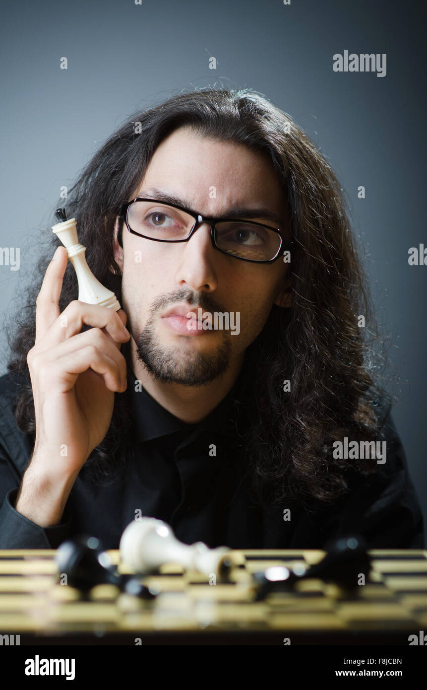Chess player playing his game Stock Photo - Alamy