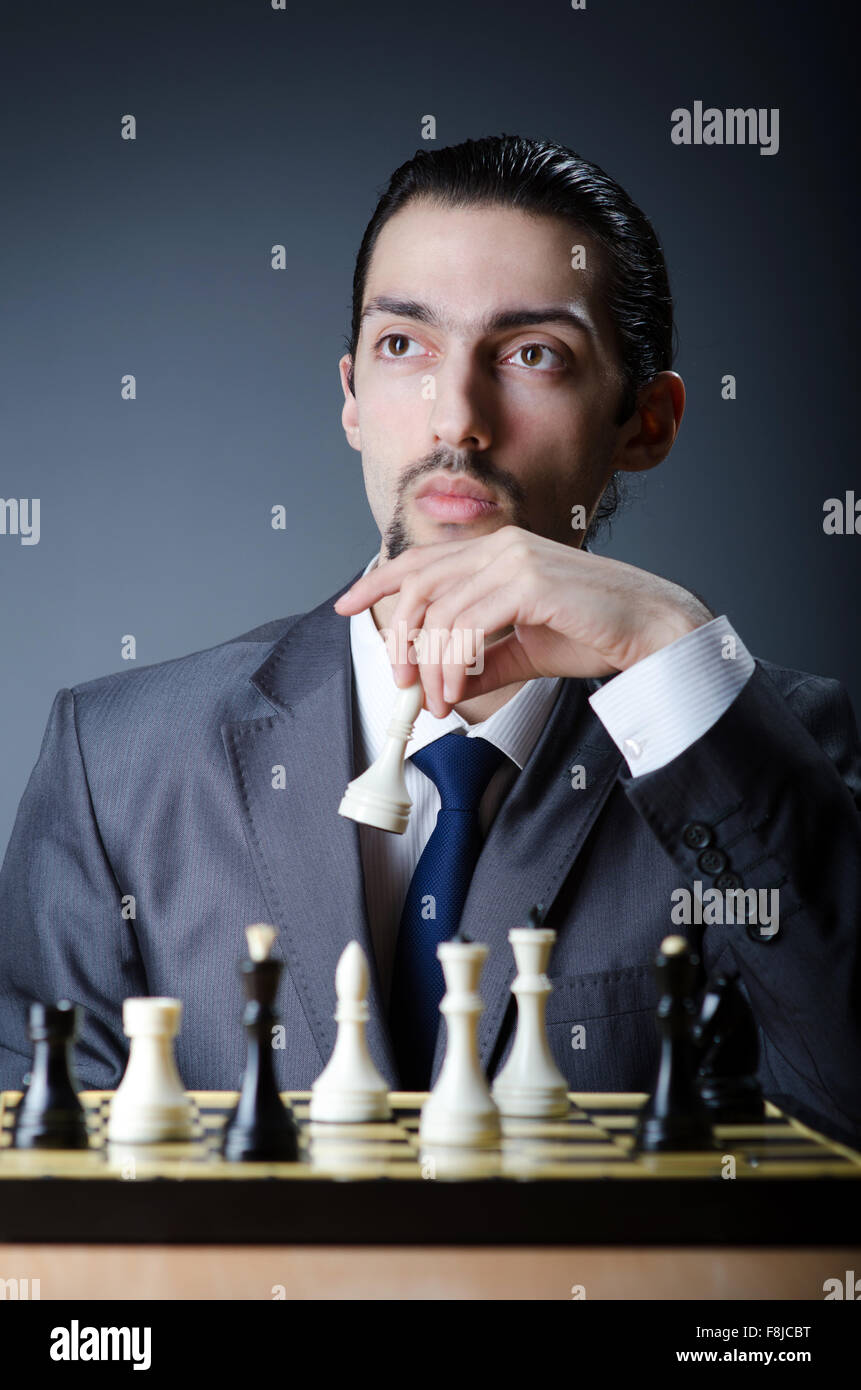 Chess player playing his game Stock Photo - Alamy