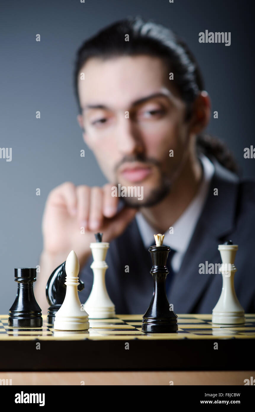 Chess player playing his game Stock Photo - Alamy