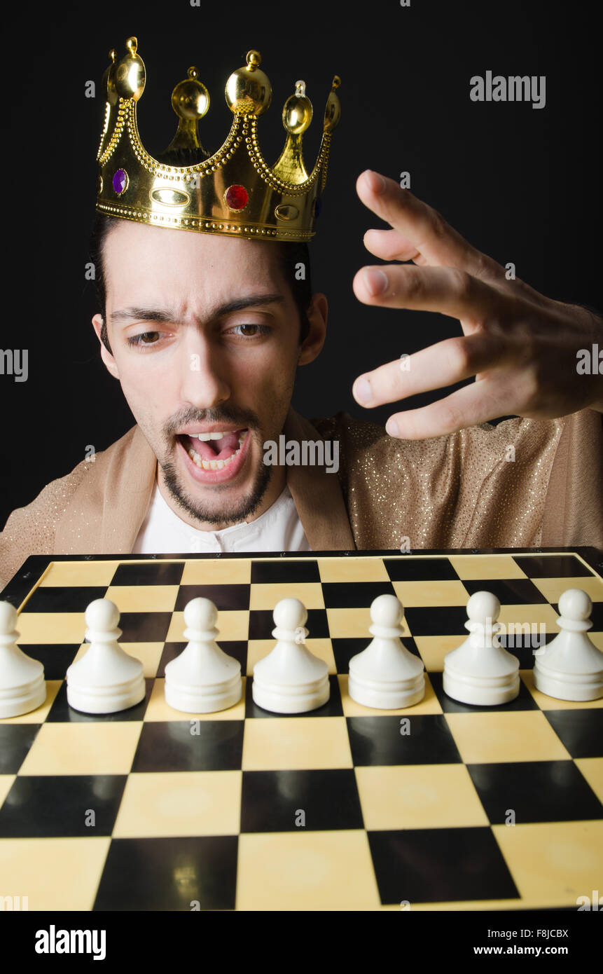 Chess player playing his game Stock Photo - Alamy