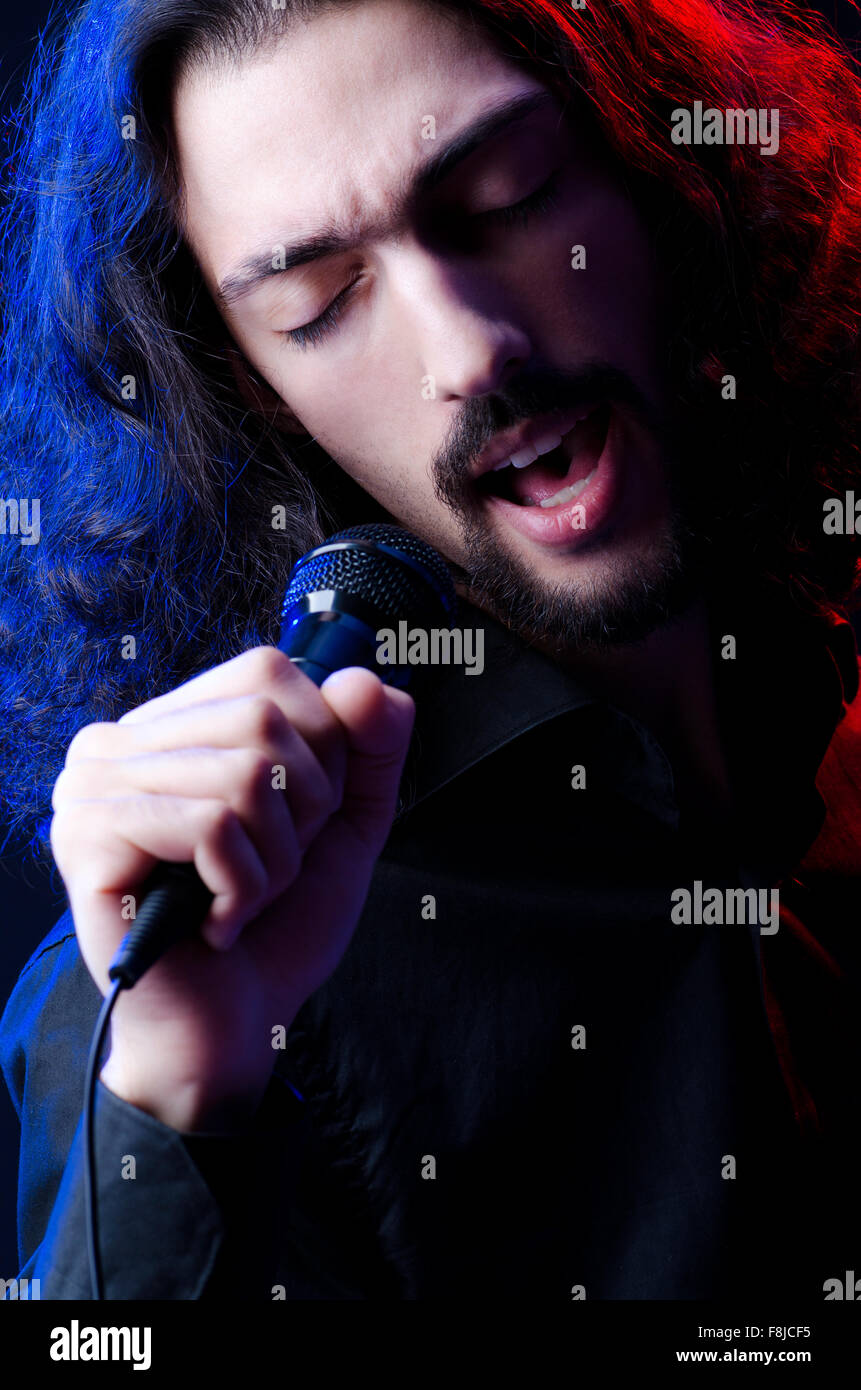 Man singing at the concert Stock Photo - Alamy