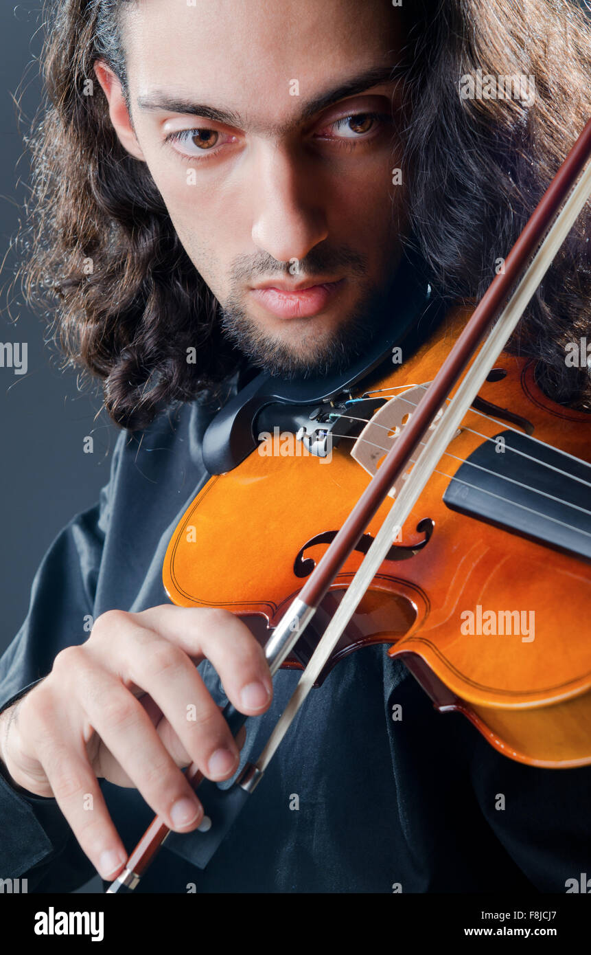 Violin player playing the intstrument Stock Photo - Alamy