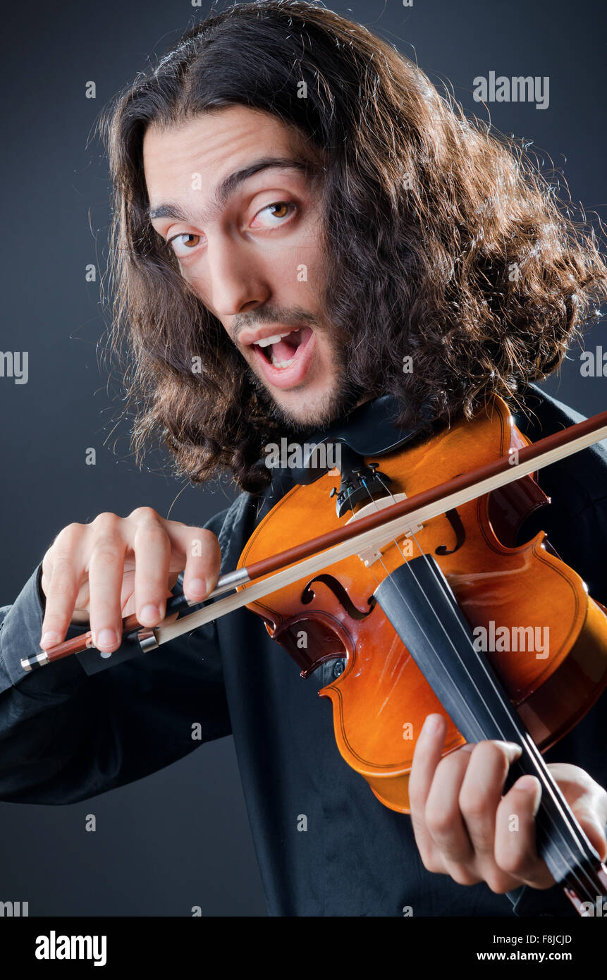 Violin player playing the intstrument Stock Photo - Alamy