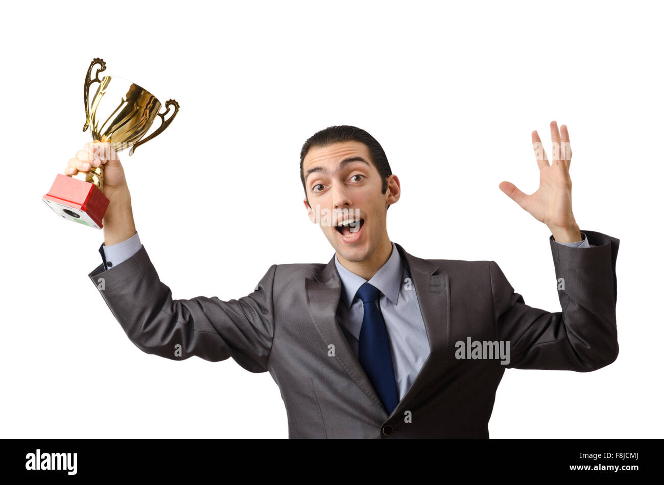 Man being awarded with golden cup Stock Photo - Alamy