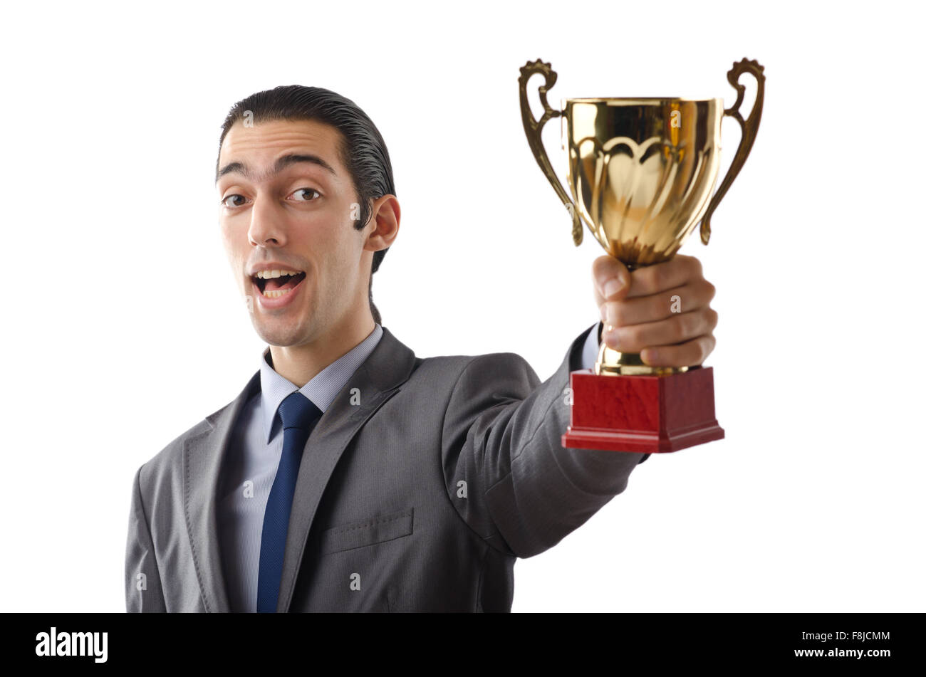 Man being awarded with golden cup Stock Photo - Alamy