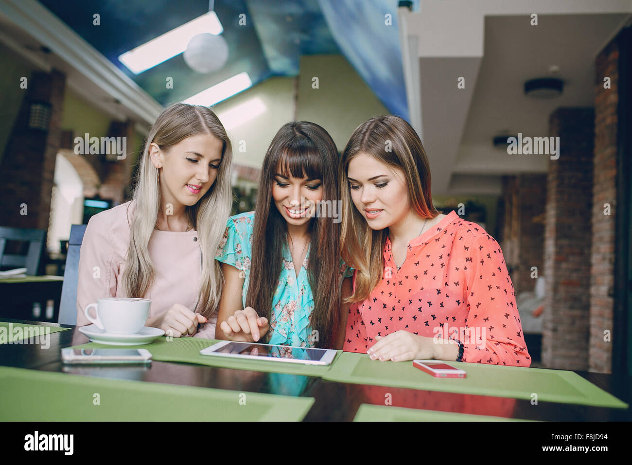 Girls with phones Stock Photo - Alamy