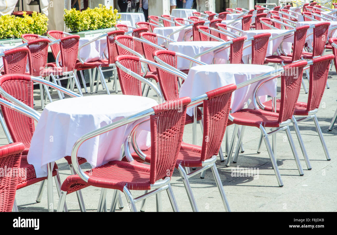 Empty tables of street cafe Stock Photo - Alamy