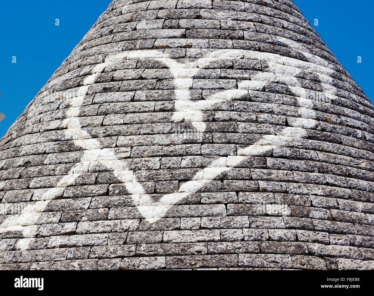 Heart and arrow painted on roof of a trullo Alberobello Puglia ApuIia ...