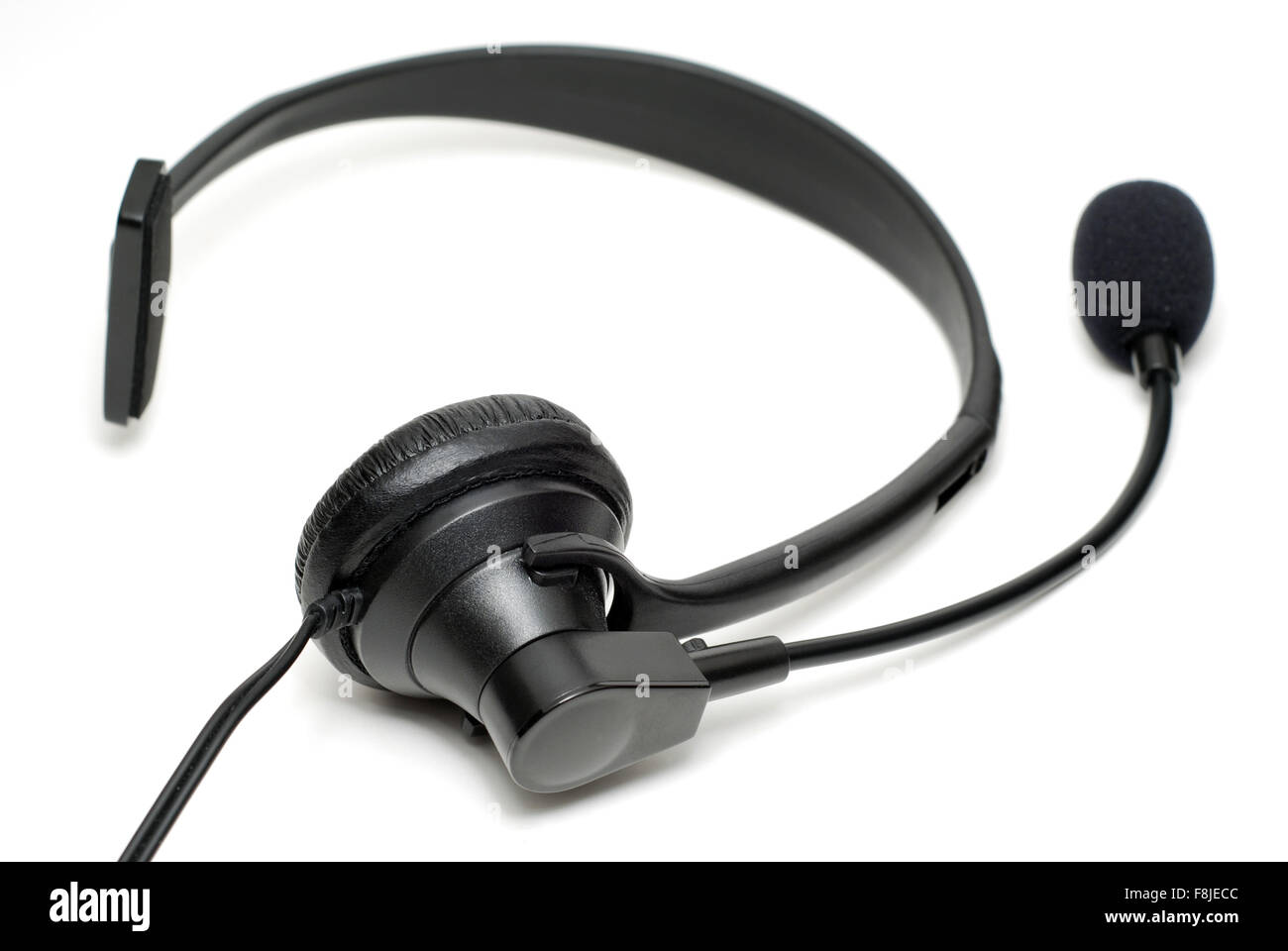 Black business telephone headset cut out isolated on a white background ...