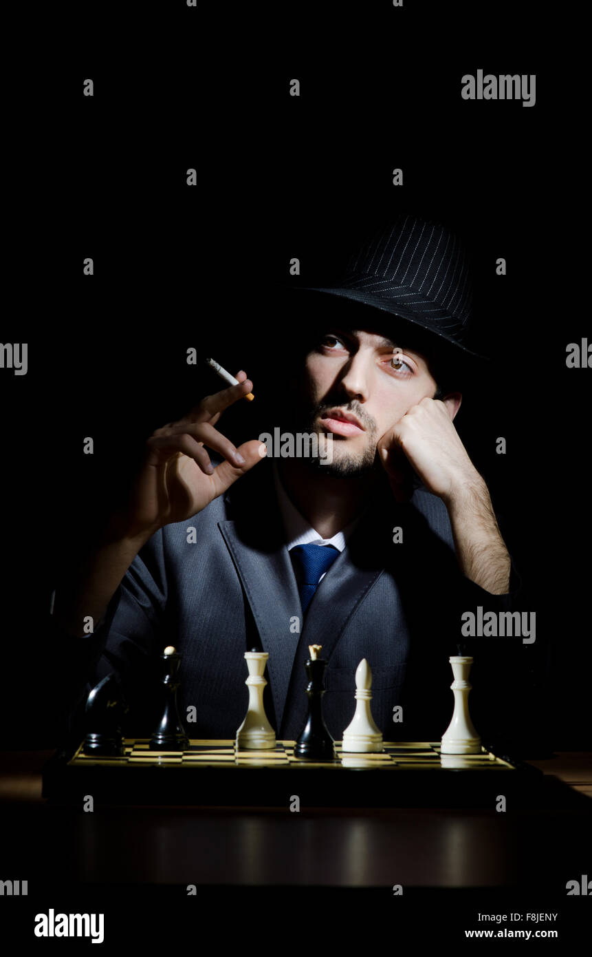 Chess player playing his game Stock Photo - Alamy