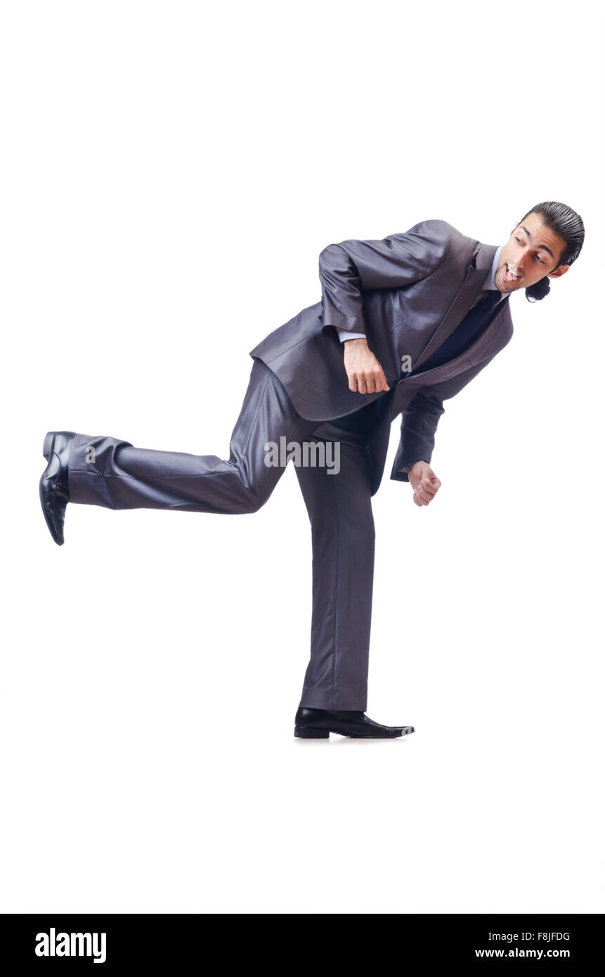 Young businessman pushing invisible obstacles Stock Photo - Alamy