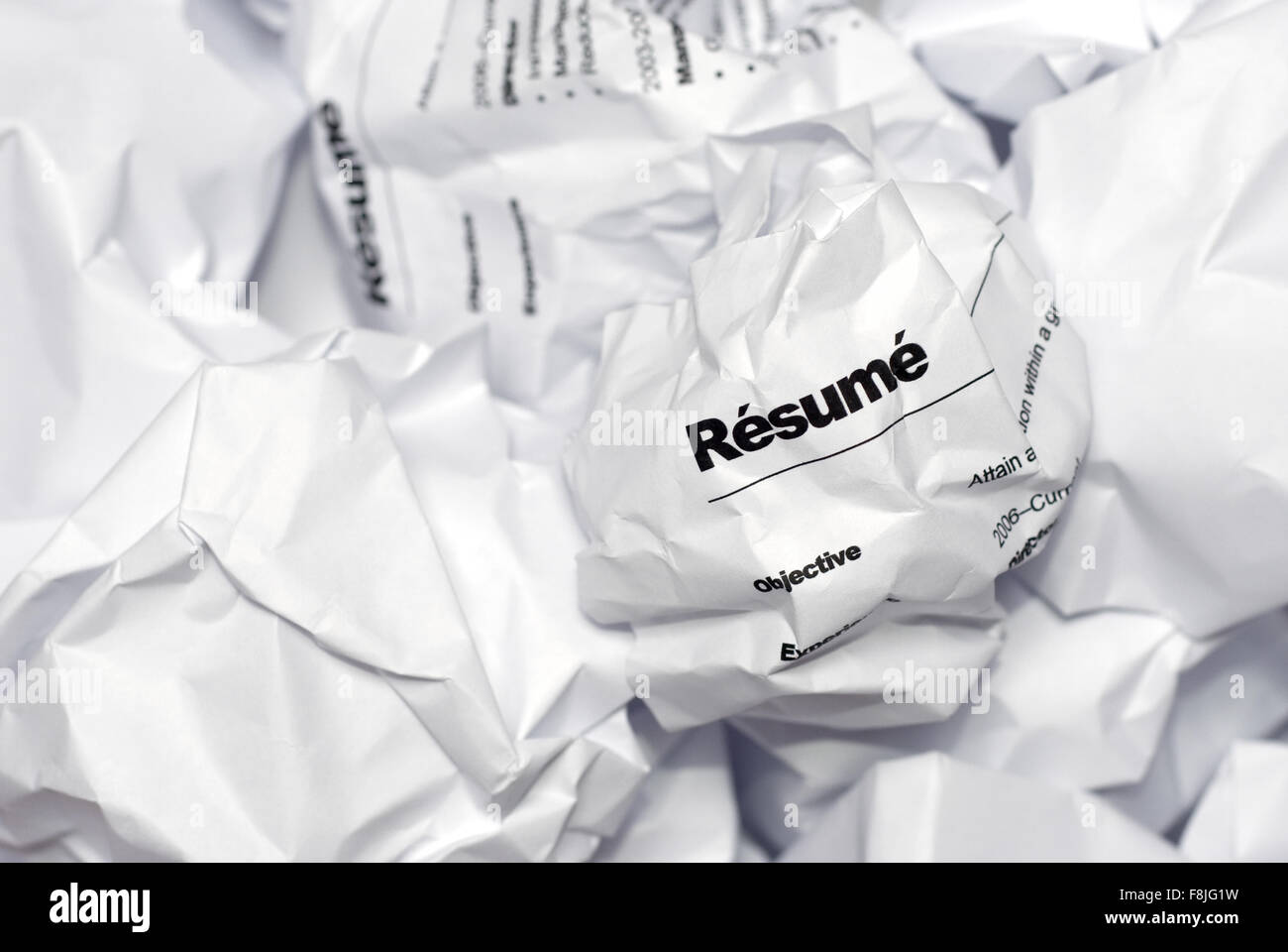 Résumé in trash. Picture of resume crumpled up and thrown away in the ...