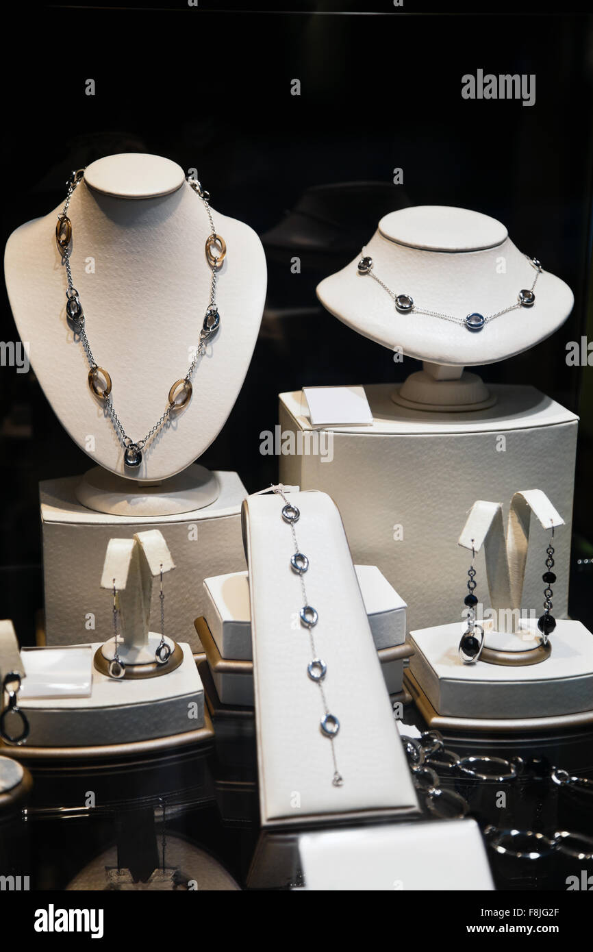 Picture of jewelry store window display with necklaces, bracelets, and ...