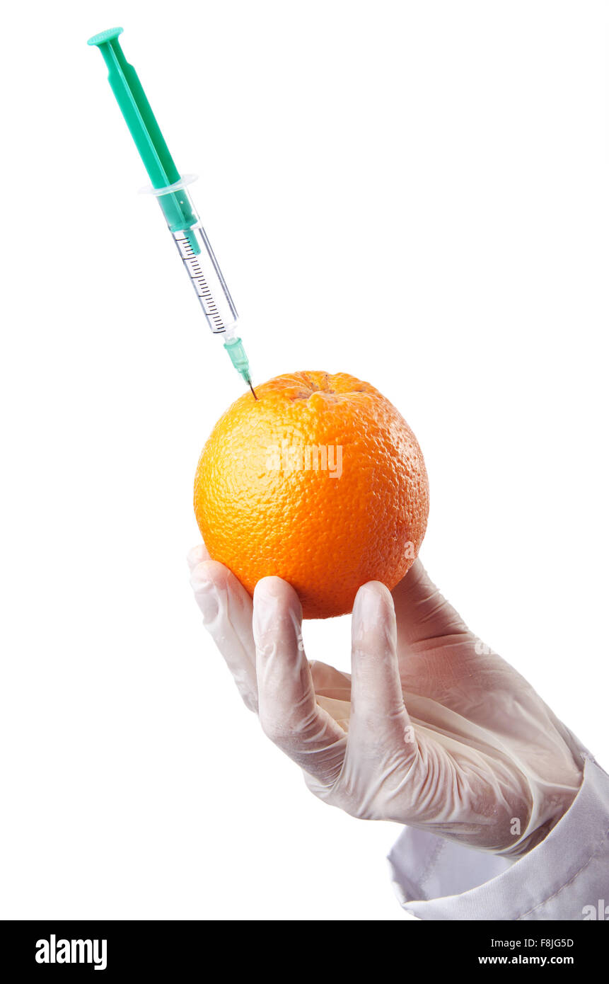 Science experiment with orange and syringe Stock Photo - Alamy